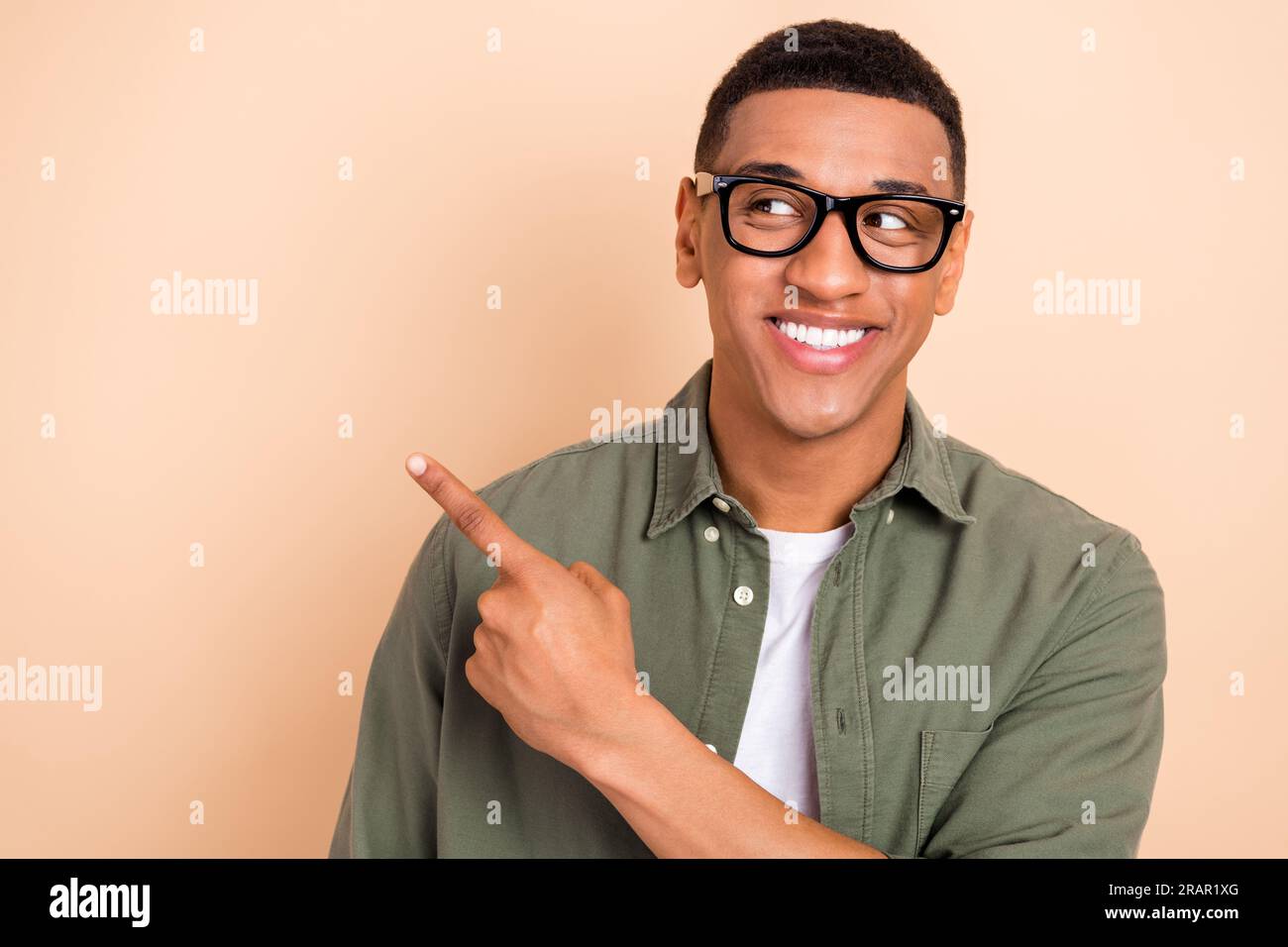 Portrait of nice positive young person beaming smile look direct finger ...