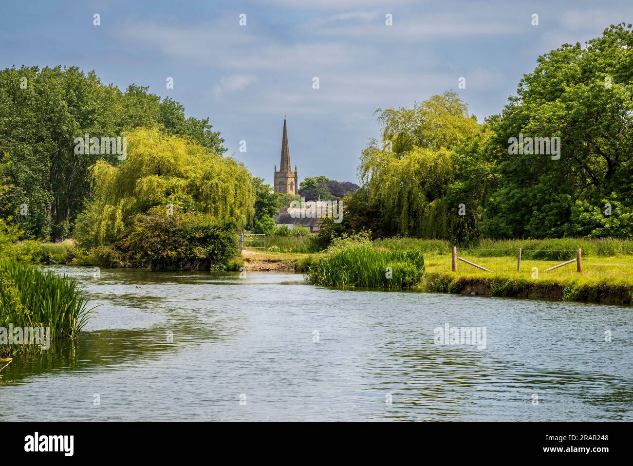 The Thames with St Lawrence church spire at Lechlade-on-Thames in the ...