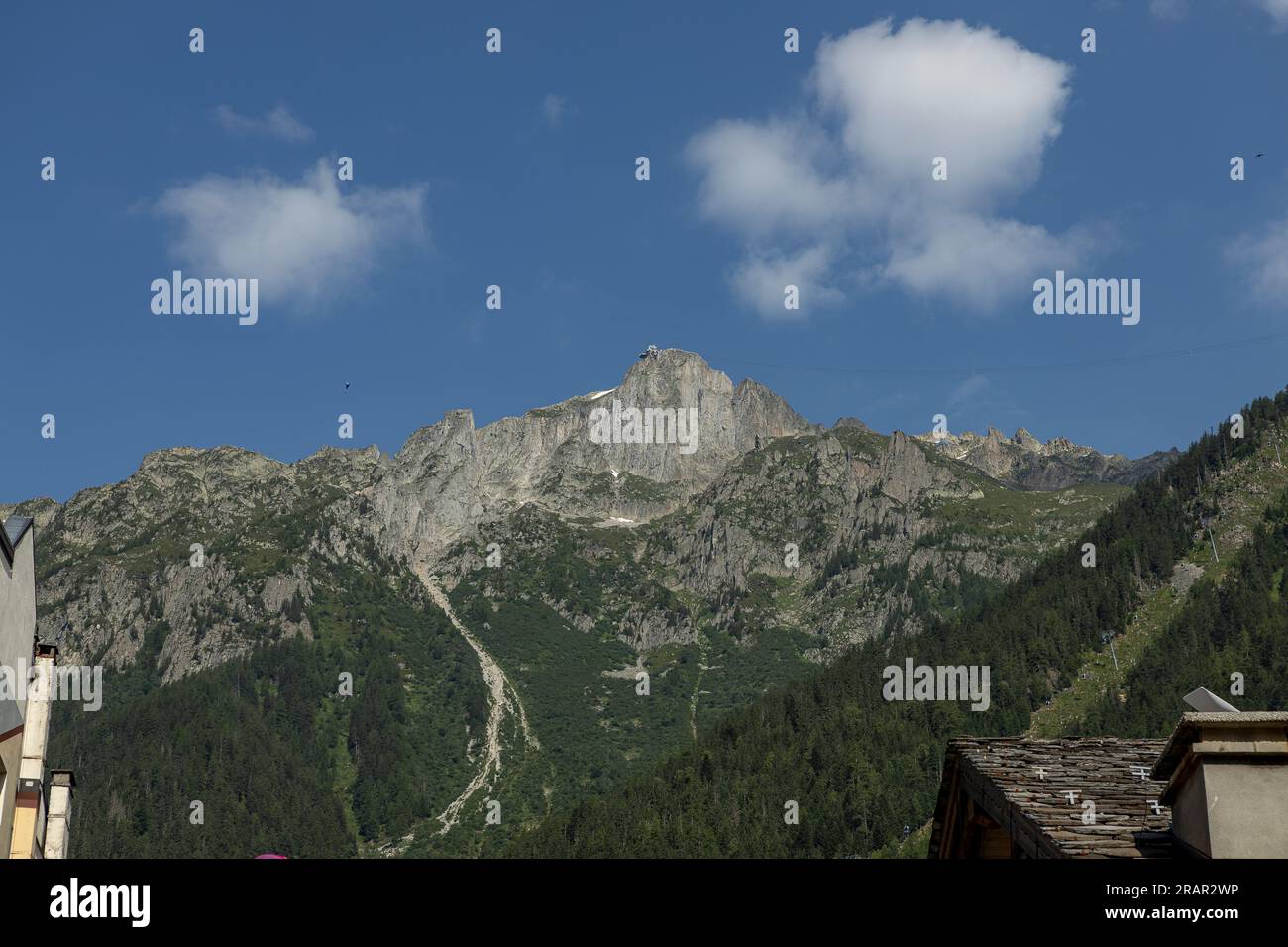 Chamonix village at the feet of the Mont Blanc Massive mountain range ...
