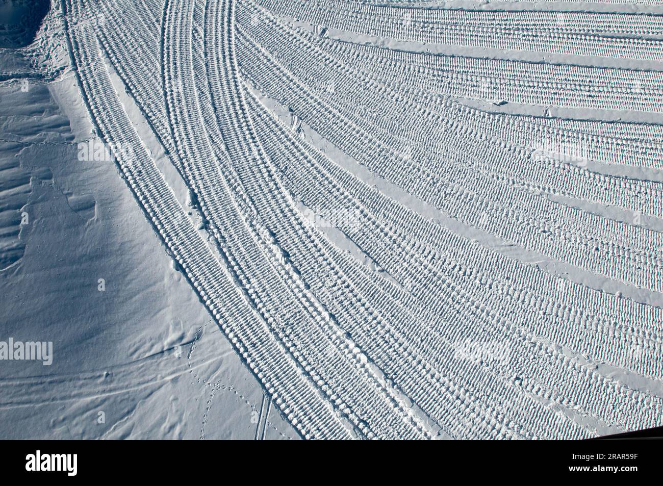 Snow patterns, created by caterpillar tracks, Tigne, France Stock Photo ...