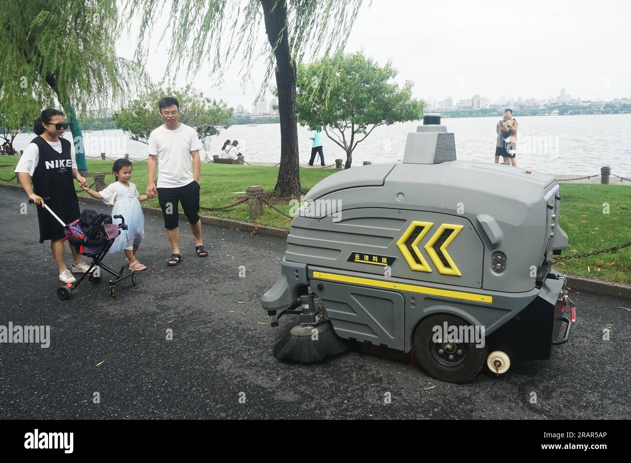 HANGZHOU, CHINA - JULY 5, 2023 - An intelligent sweeping robot performs ...
