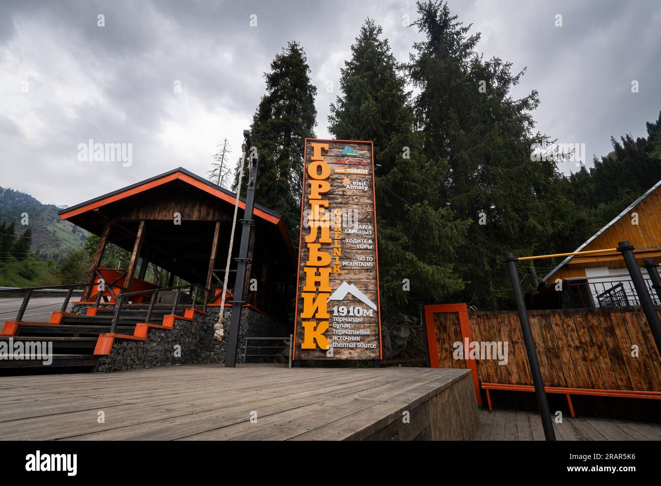 Hot springs geothermal water in mountains. Vat with hot geothermal ...