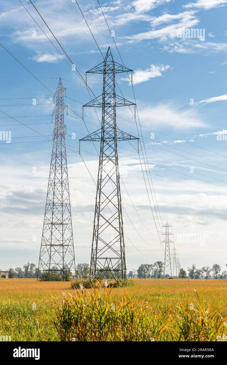 power line in plain, malpaga, italy Stock Photo - Alamy