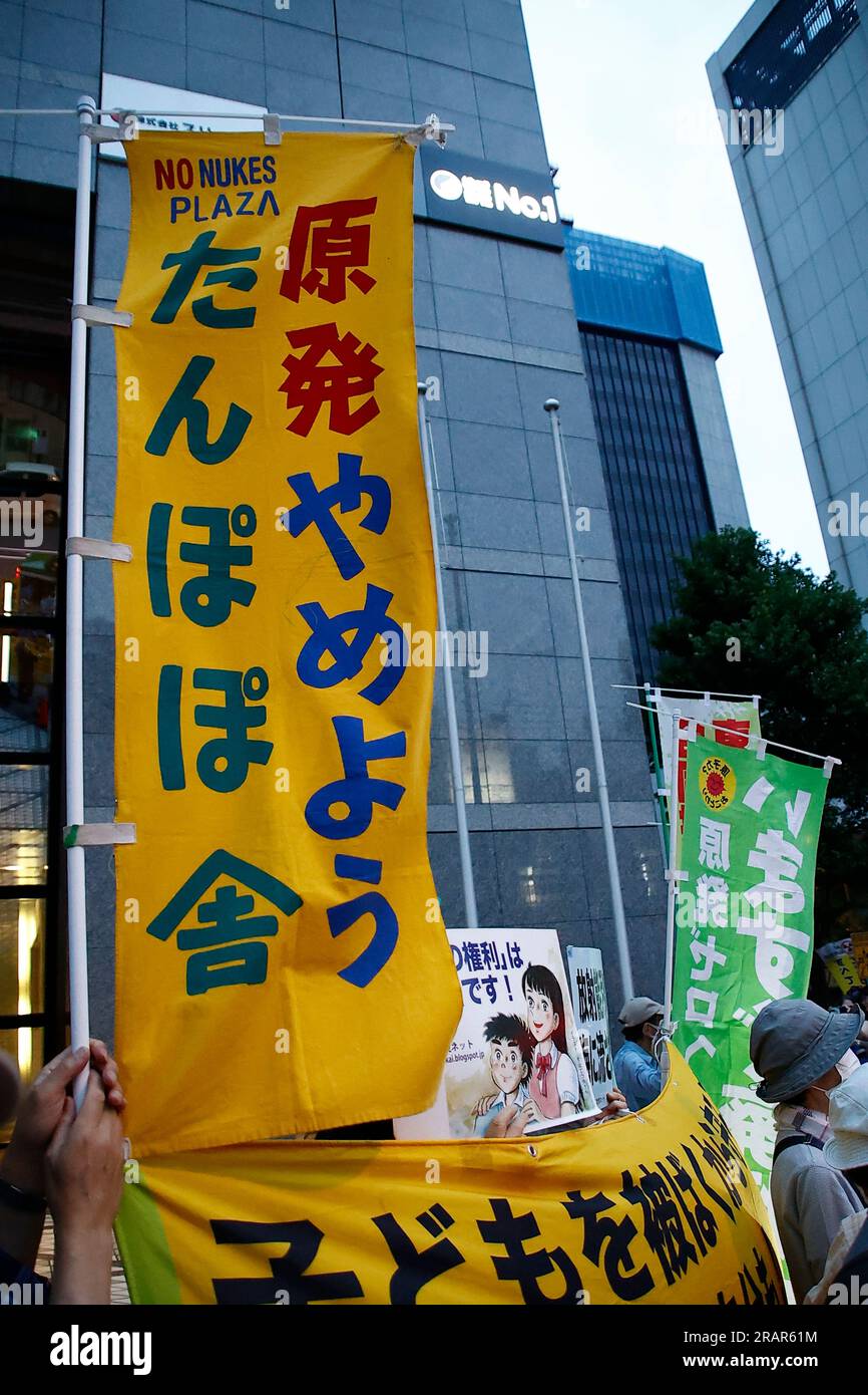 Tokyo, Japan. 5th July, 2023. People holding NO NUKES placards protest ...