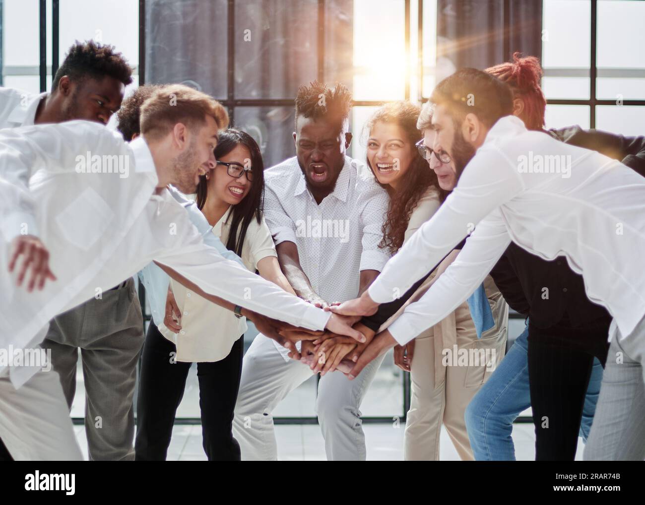 Teamwork and team spirit ,handshake in a group after work succe Stock ...