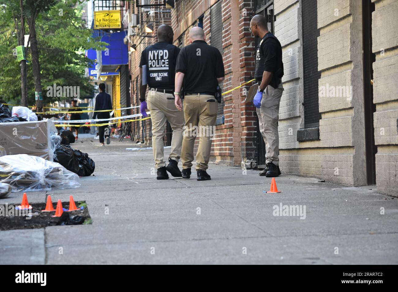 Crime scene investigation scours the crime scene. Double shooting in ...