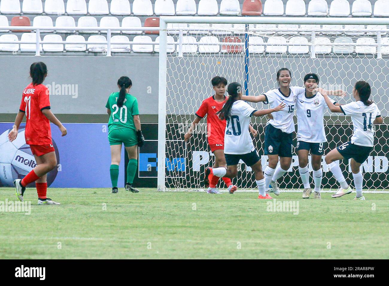 Palembang, Indonesia. 5th July, 2023. Players of Cambodia celebrate scoring during the Group A ...