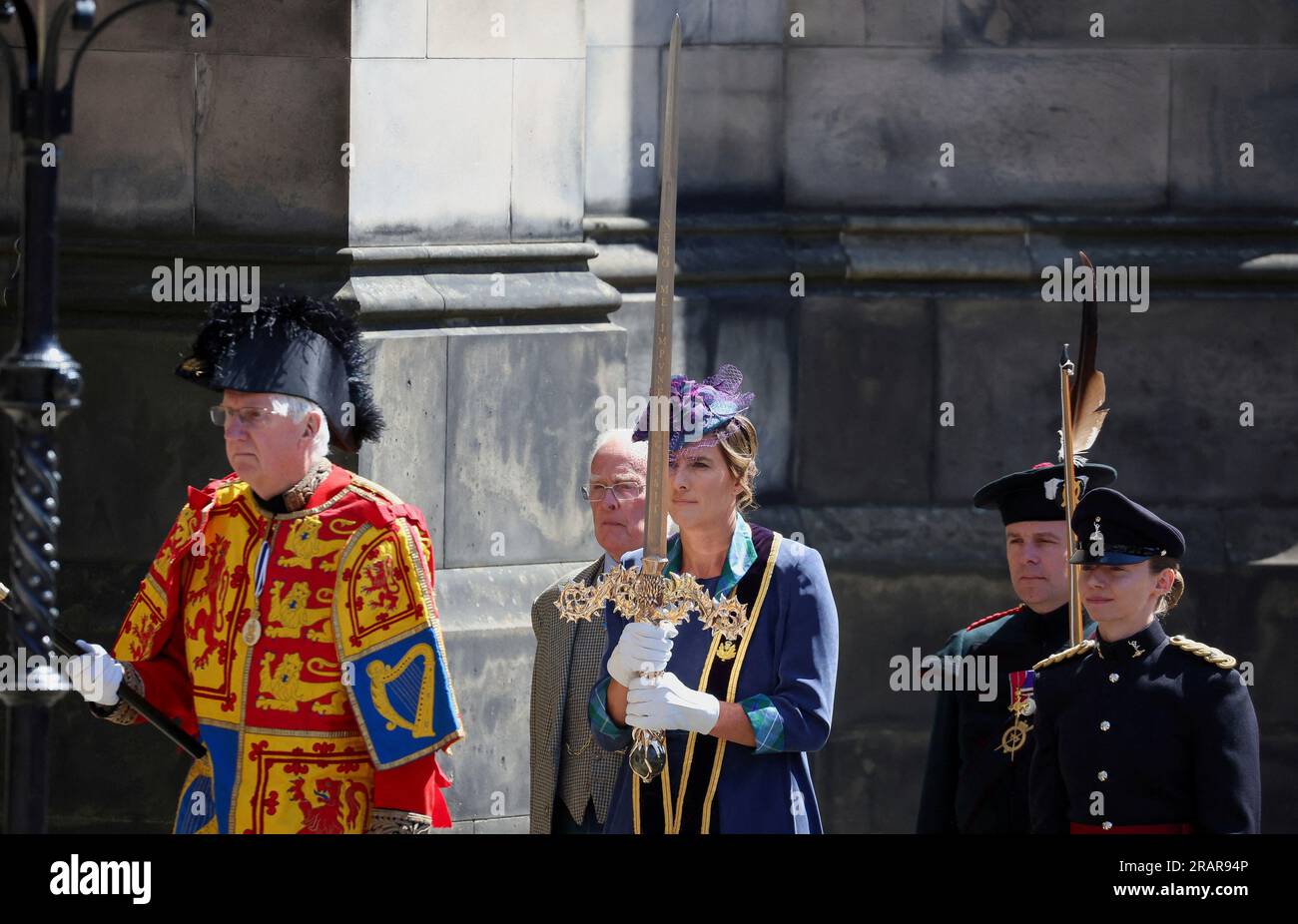 Olympic rower Katherine Grainger carries the Elizabeth Sword, designed ...