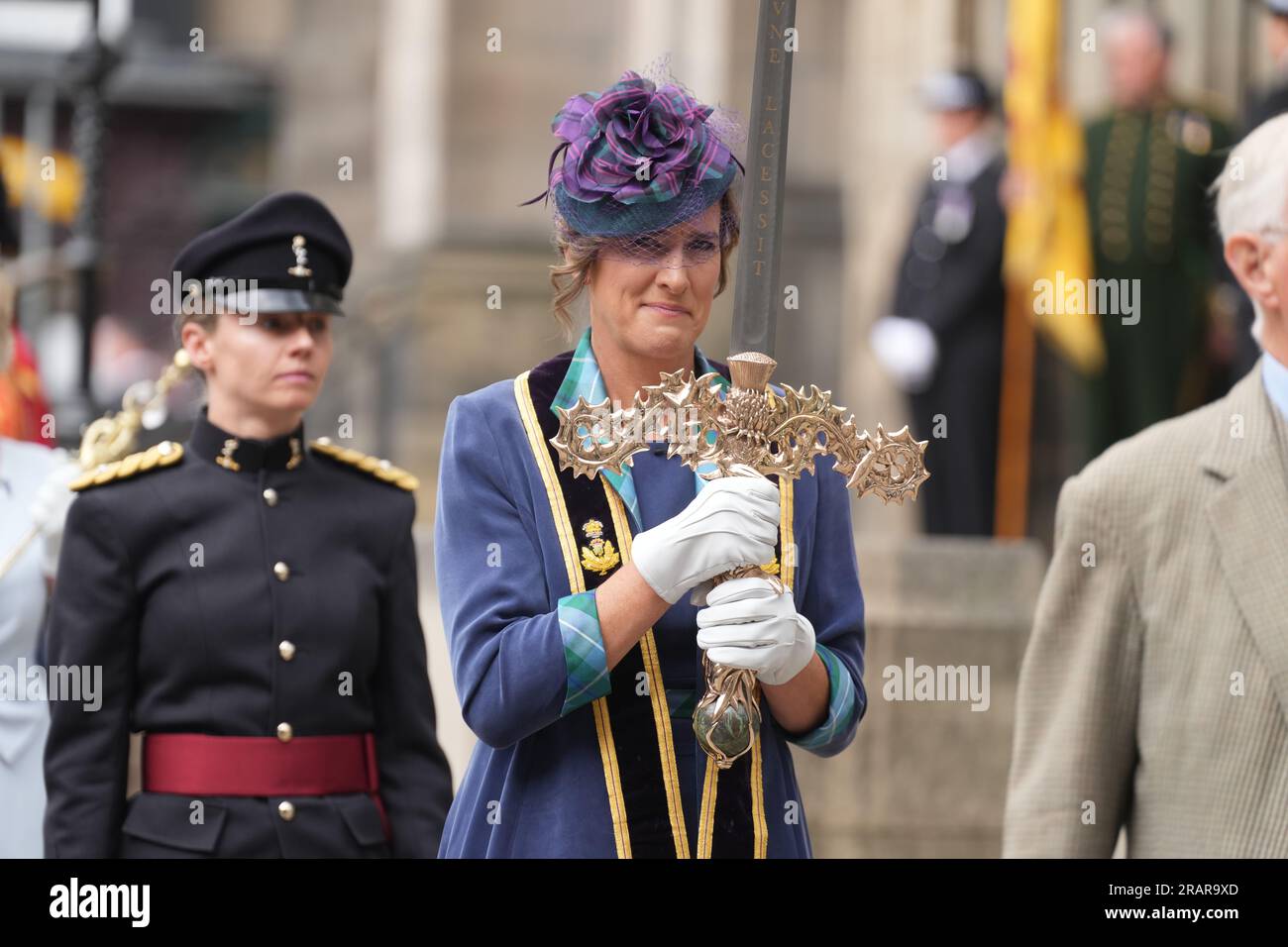 Dame Katherine Grainger carries The Elizabeth Sword, which forms part ...