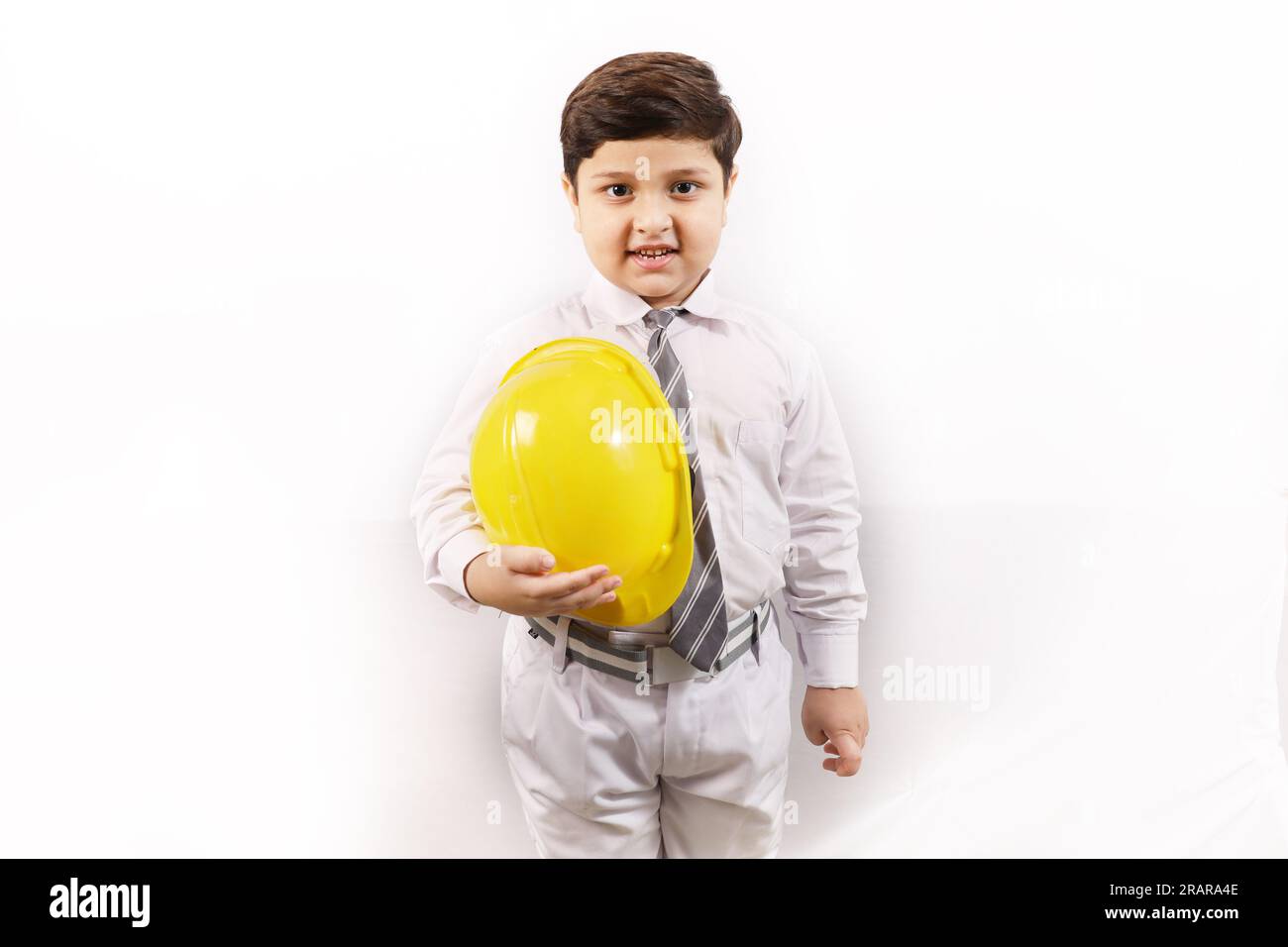 Portrait of Happy school kid as construction worker. Better and stable ...