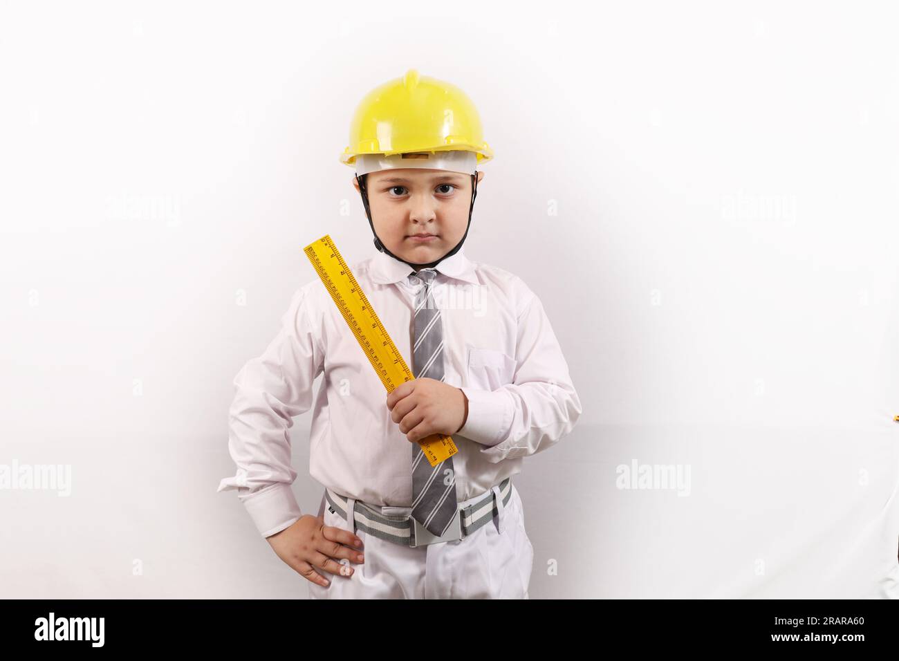 Portrait of Happy school kid as construction worker. Better and stable ...