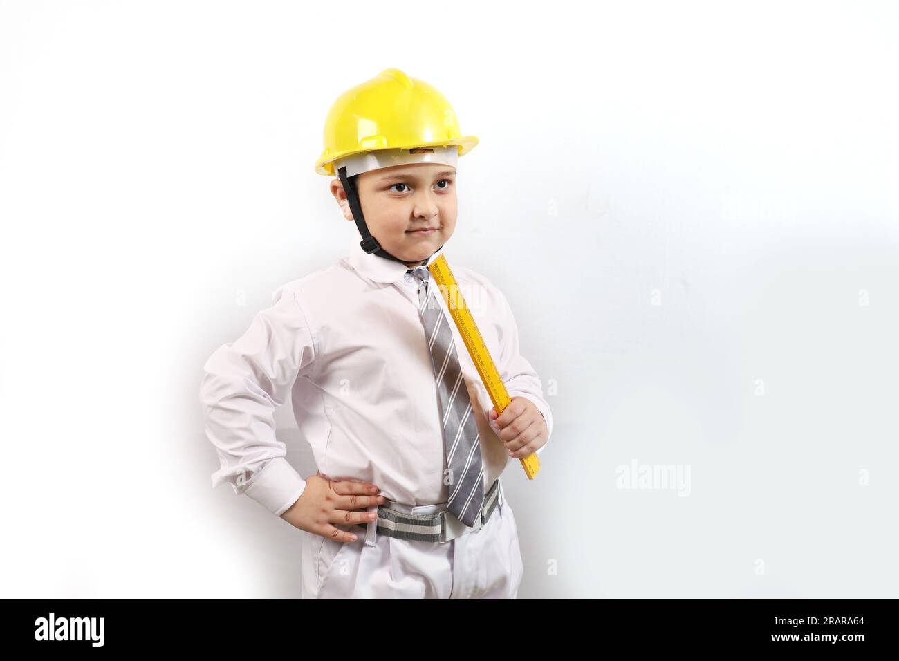 Portrait of Happy school kid as construction worker. Better and stable ...