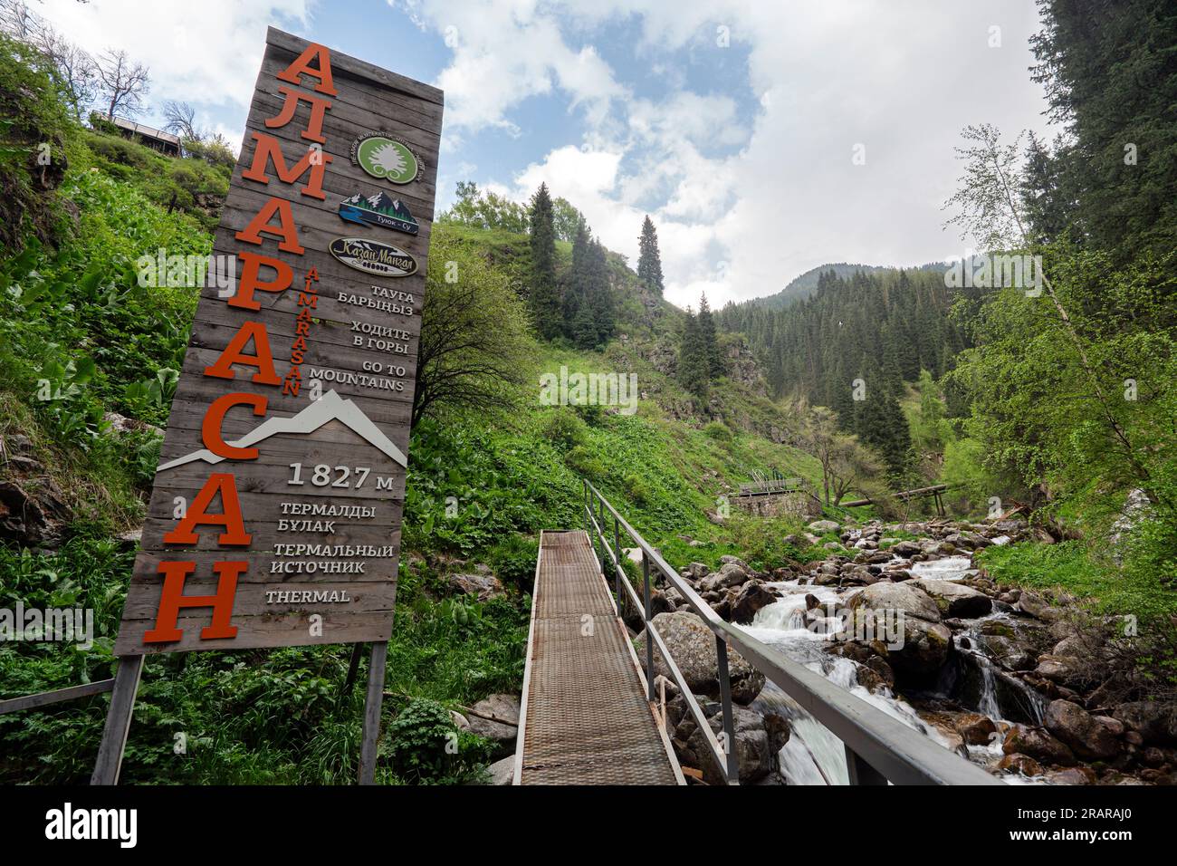 Hot springs geothermal water in mountains. Vat with hot geothermal ...