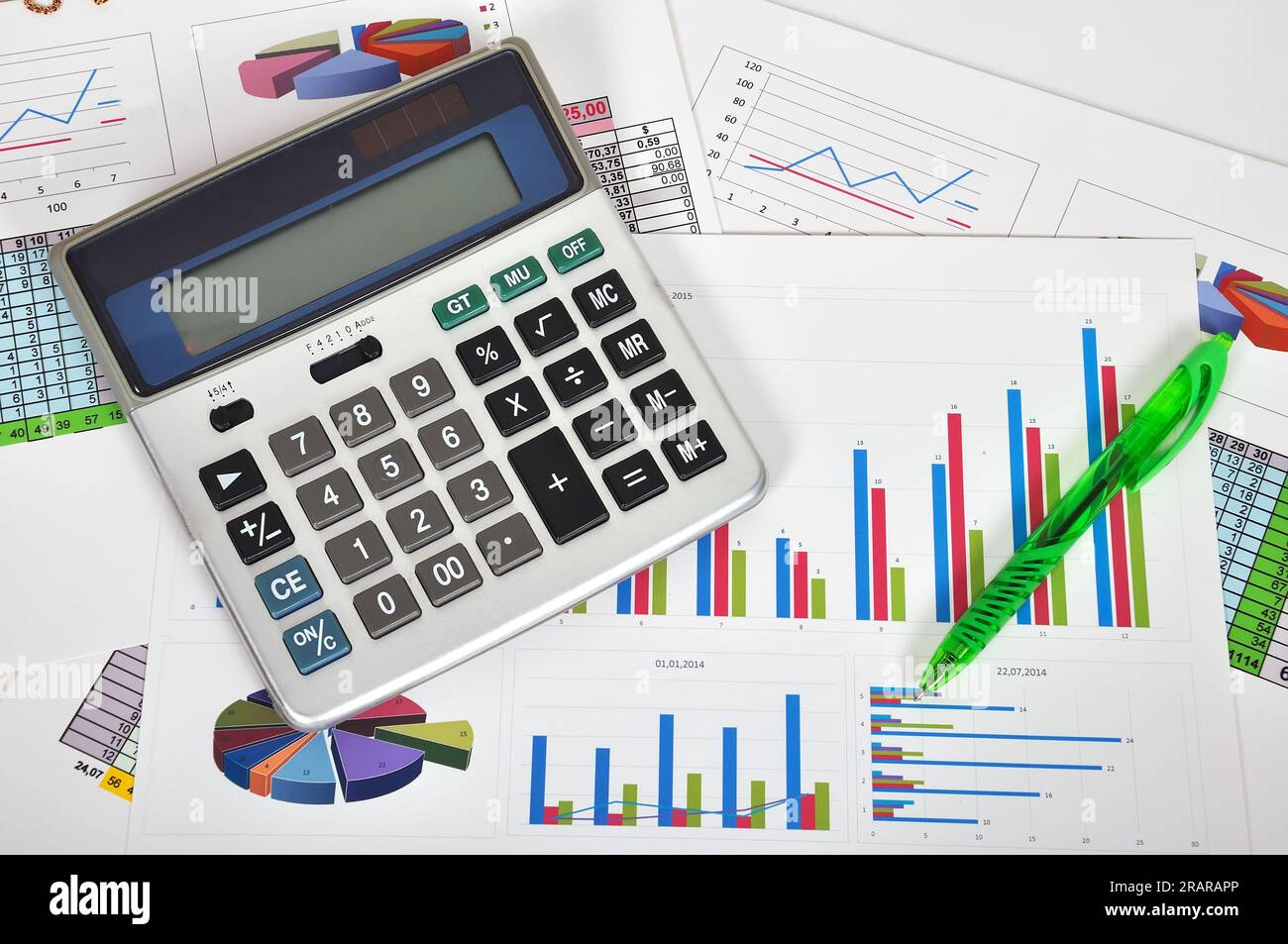 Business concept with documents, calculator and pen Stock Photo - Alamy