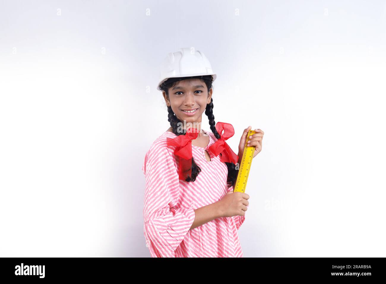 Portrait of Happy school kid as construction worker. Better and stable future concept. The ...
