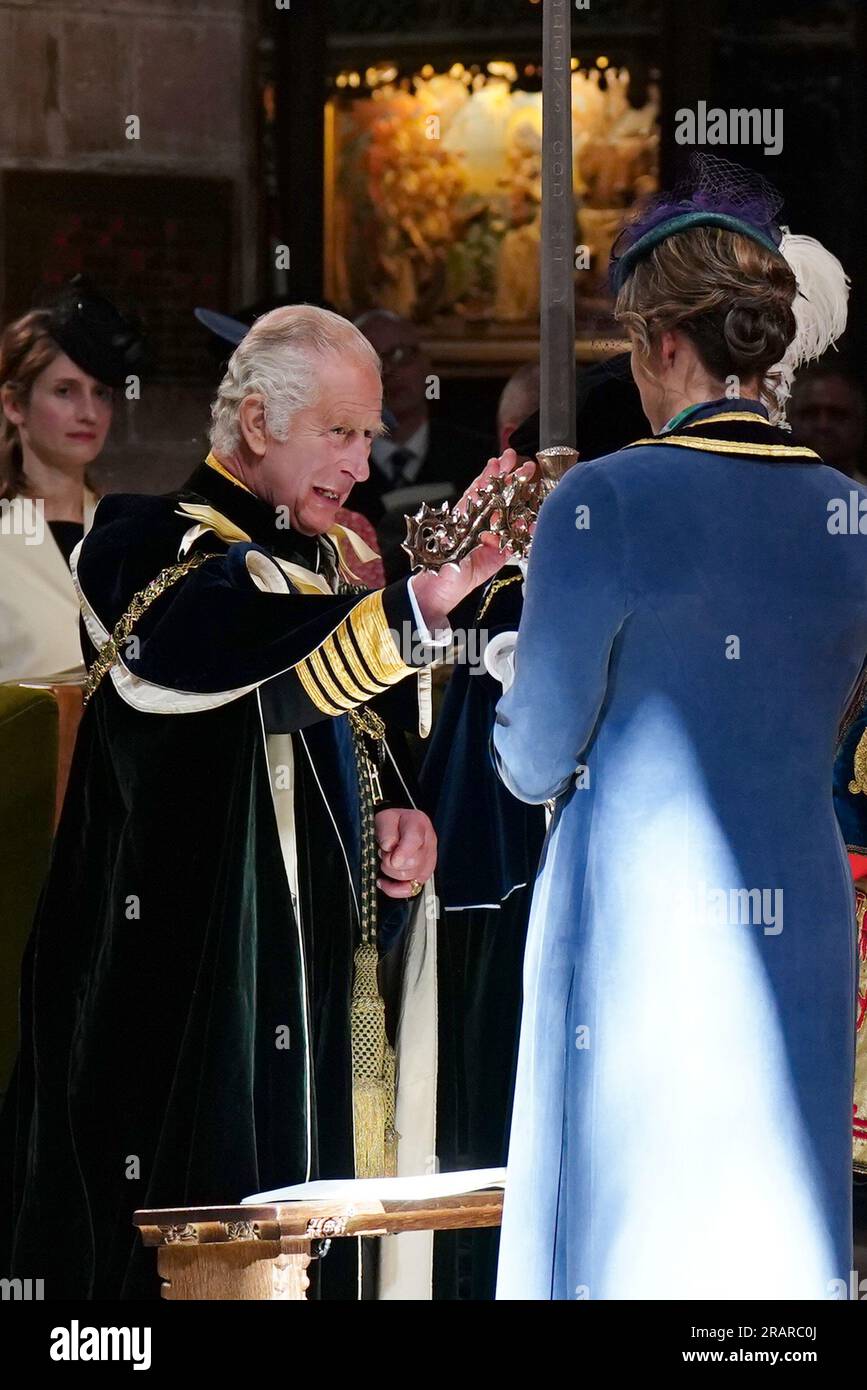 King Charles III is presented with the Elizabeth Sword during the ...