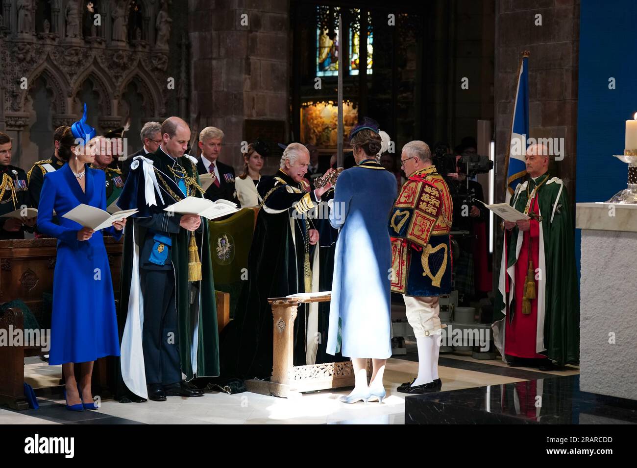 King Charles III, joined by the Prince and Princess of Wales, known as ...