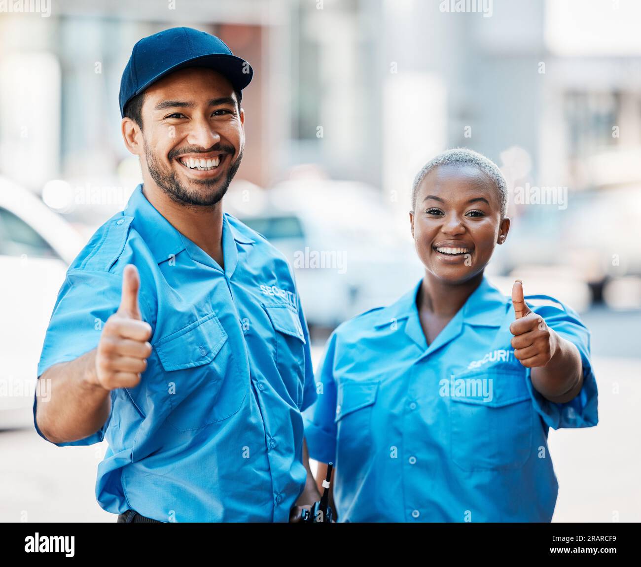 Security guard, safety officer and team thumbs up on street for ...