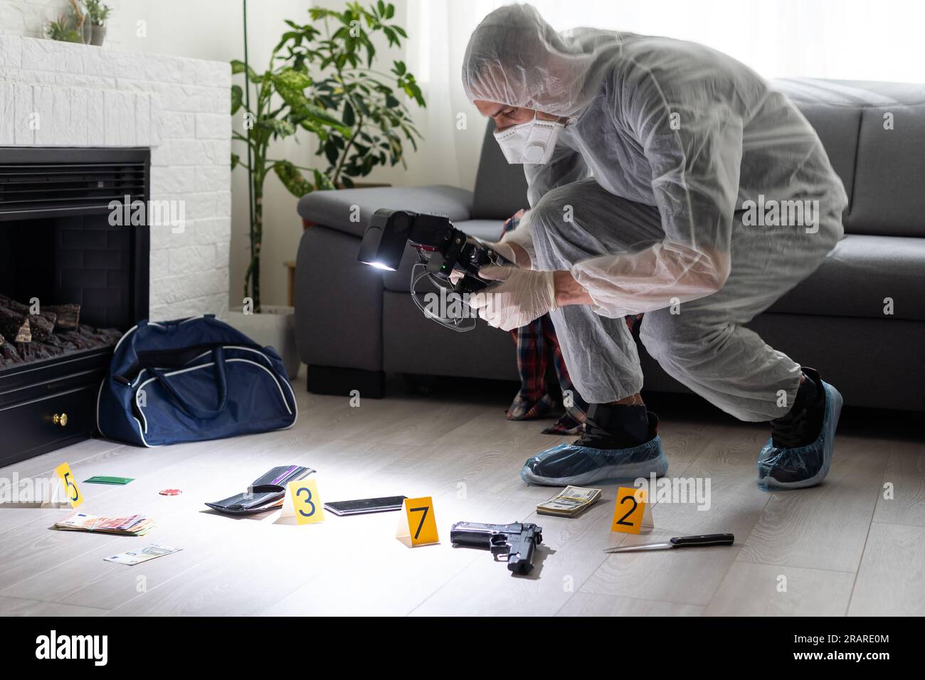 Detective Collecting Evidence in a Crime Scene. Forensic Specialists ...