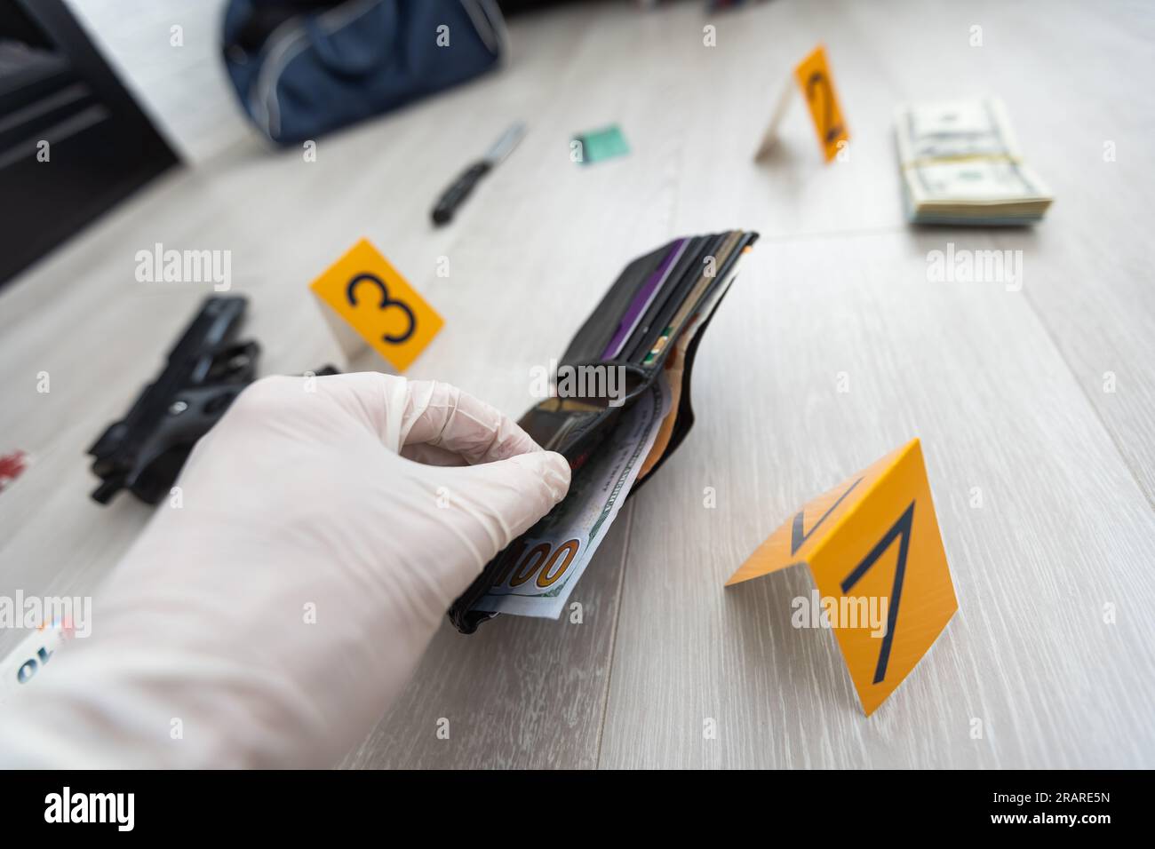 Close up on hands of unknown man forensic police investigator ...