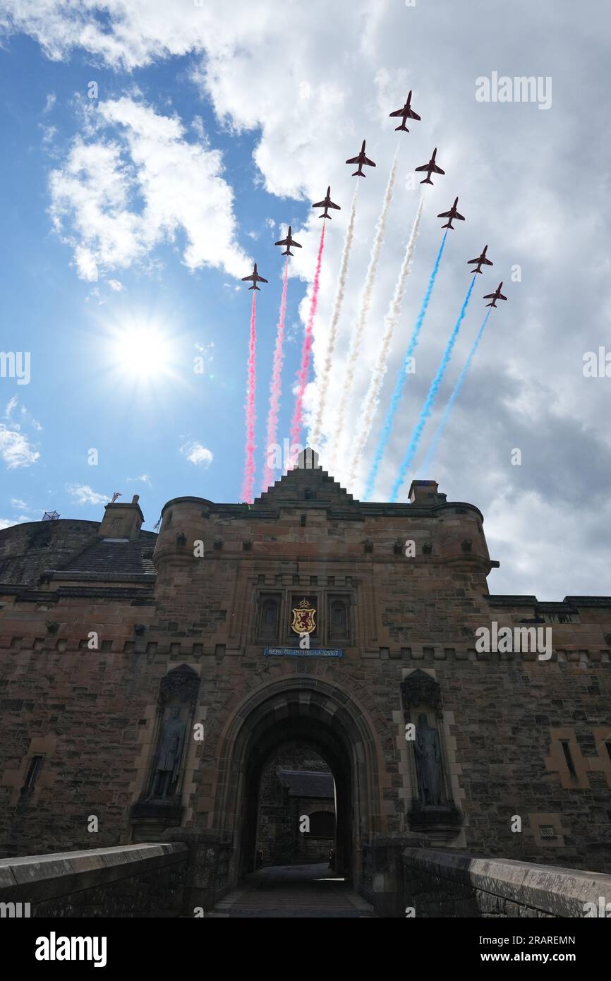 A fly past over Edinburgh Castle by the Red Arrows for the National ...