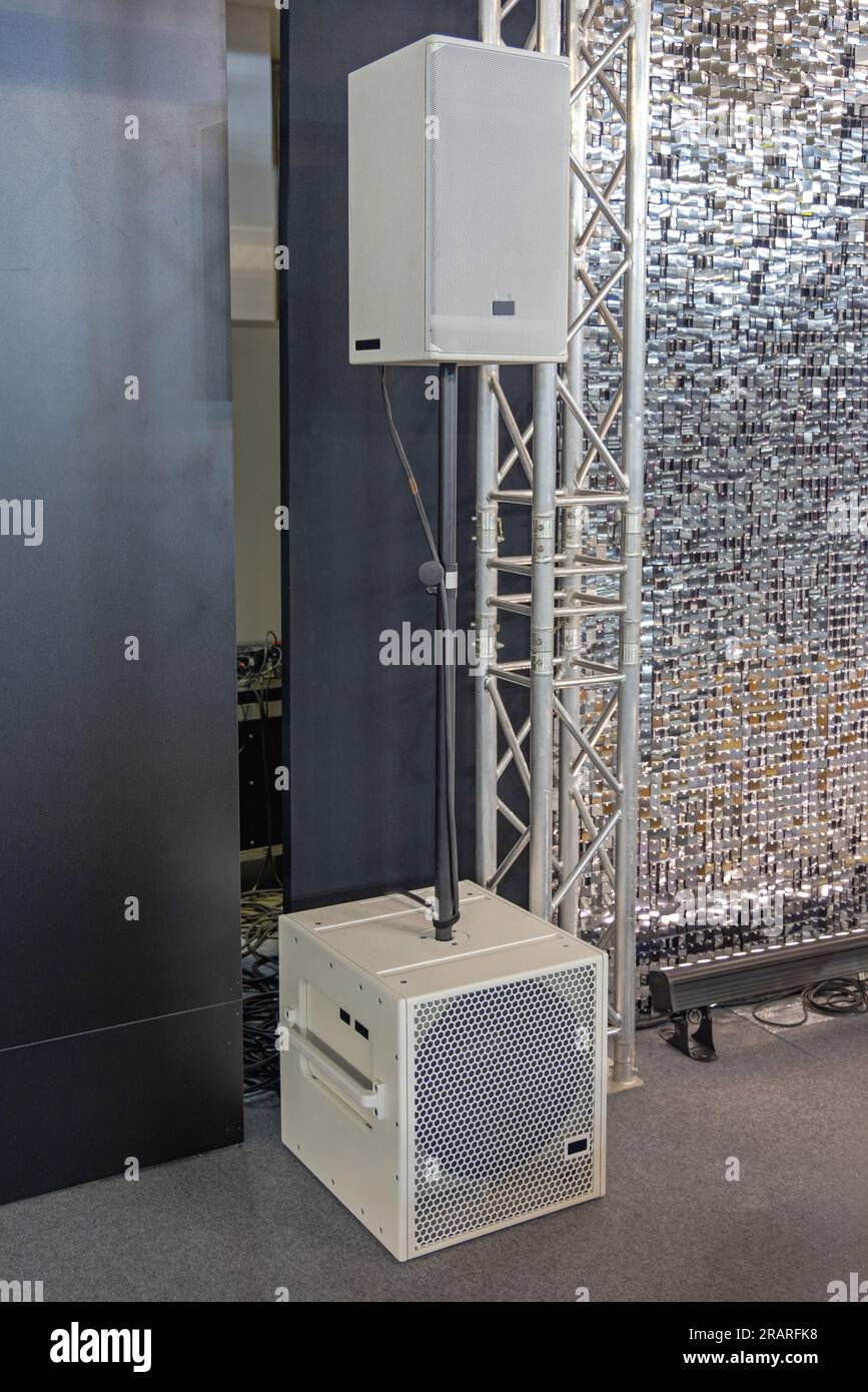 White Audio Speakers at Pole With Subwoofer Set in Disco Club ...