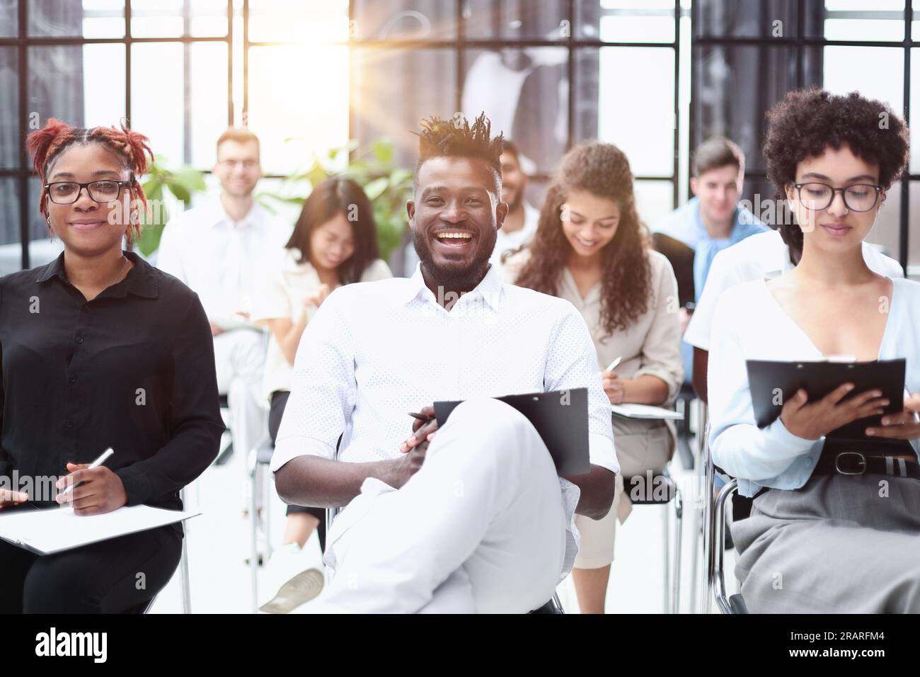 People attending seminar hi-res stock photography and images - Alamy