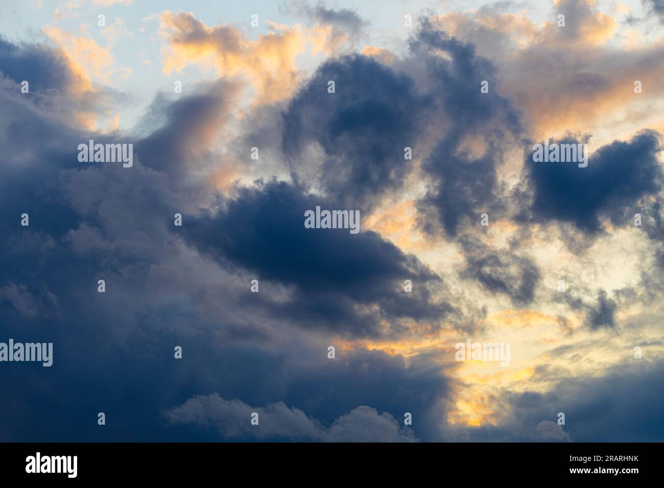 beautiful stormy sky with the sun peeping through. sky during a storm ...
