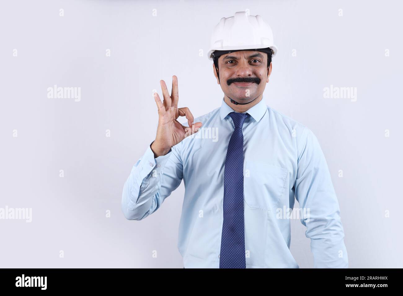 Happy Indian Construction worker doing engineer concept for a better ...