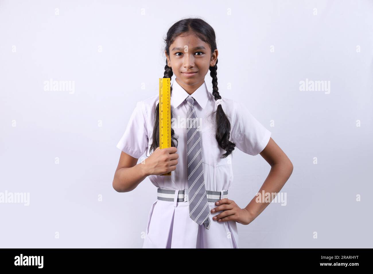 Indian Rural villager girl doing education concept and preparing herself to become successful in ...