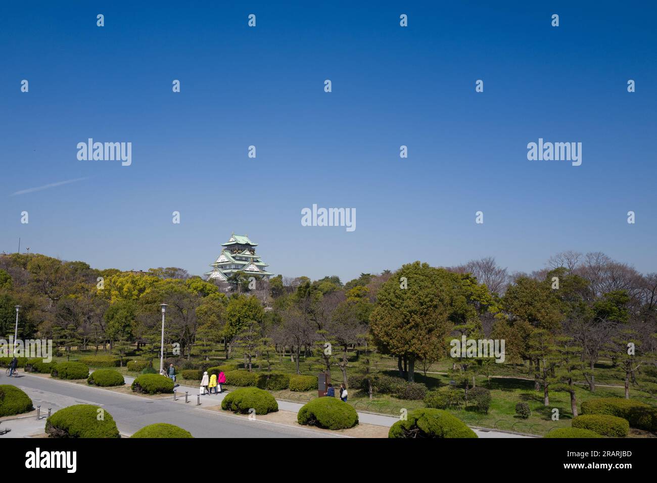 Wide view of Osaka castle with trees and clear blur sky Stock Photo - Alamy