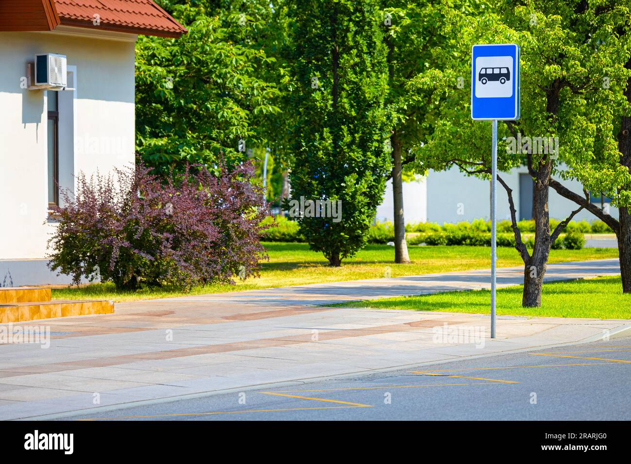 empty bus stop in a small town. bus stop sign. city bus stop Stock ...