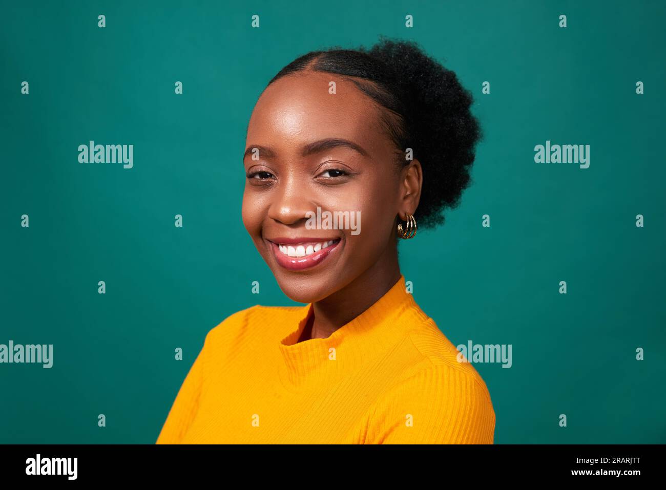 Model striking pose afro hi-res stock photography and images - Alamy