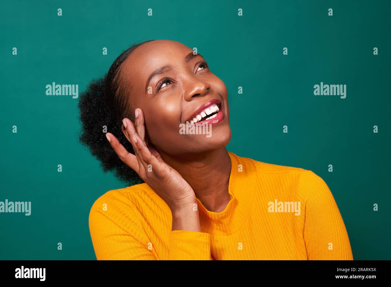 Model striking pose afro hi-res stock photography and images - Alamy