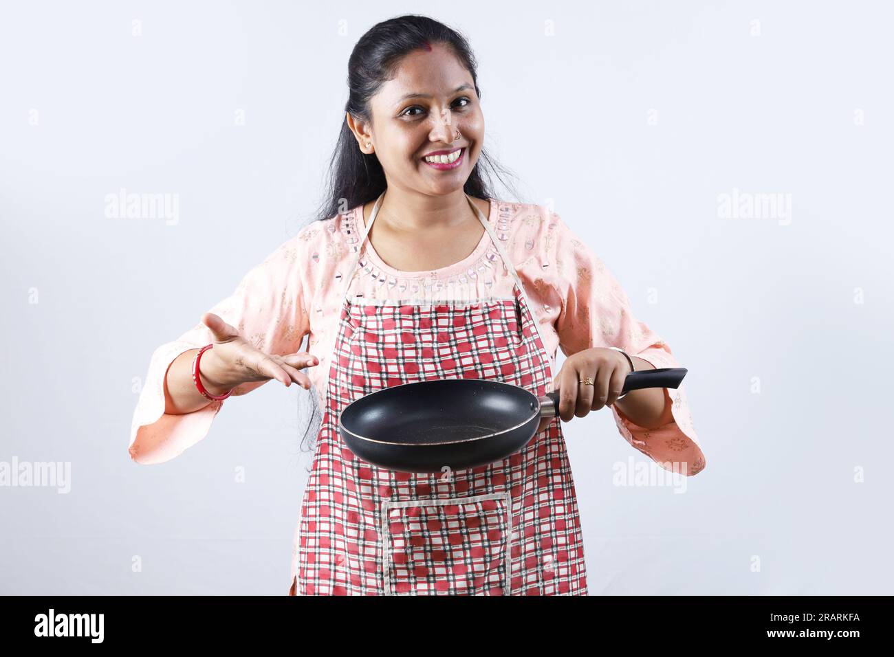 Indian lady cooking hi-res stock photography and images - Alamy