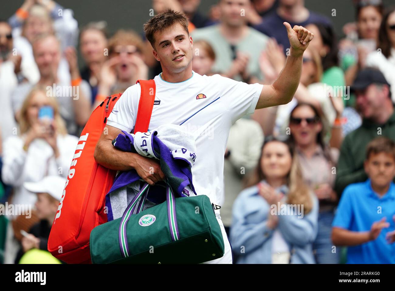 Arthur Fery waves to the crowd following his defeat to Daniil Medvedev ...