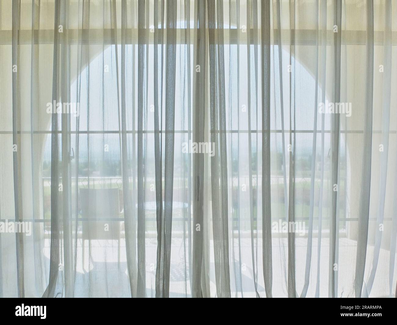 See through curtain decoration with outdoor view Stock Photo - Alamy