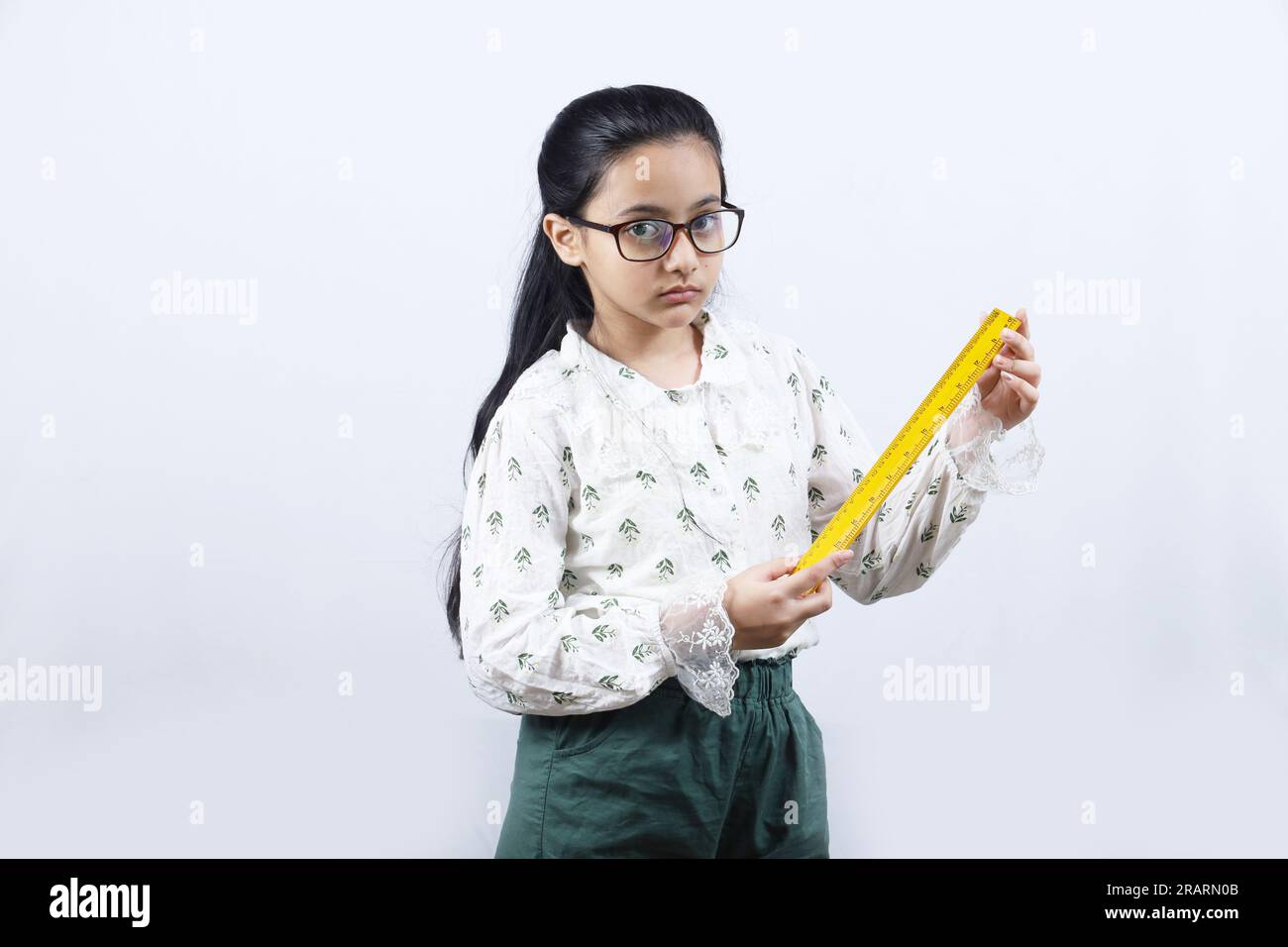 Children measuring with ruler hi-res stock photography and images - Alamy