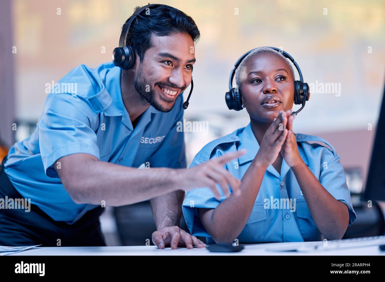 Security, surveillance and a man training a black woman in a control ...