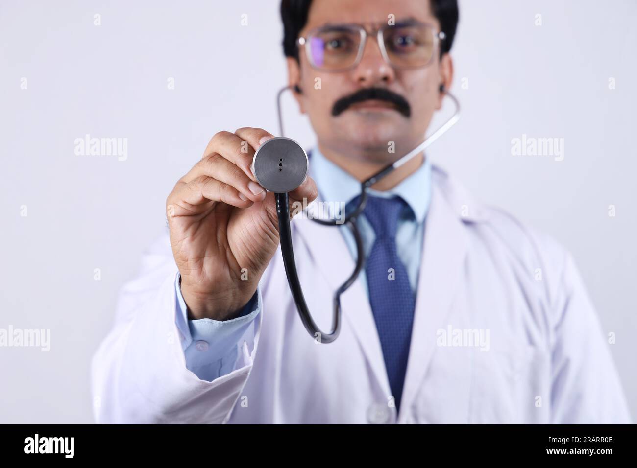 Beautiful portrait of a happy Indian female doctor in uniform wearing ...