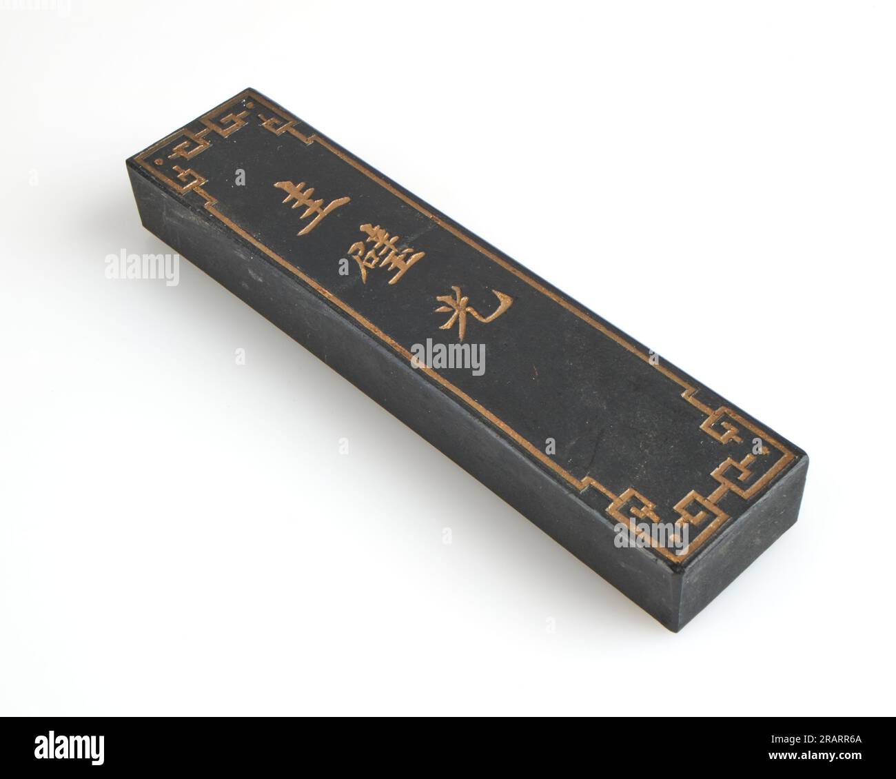 Antique or vintage chinese inscribed ink stick block cake hi-res stock ...