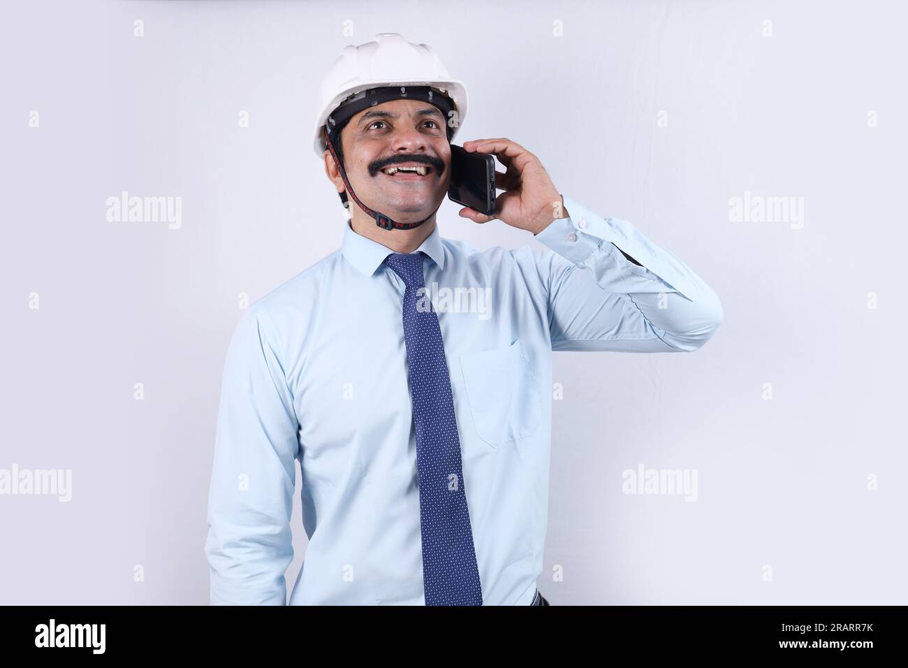 Happy Indian Construction worker doing engineer concept for a better ...