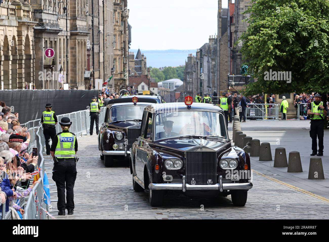 The royal procession travels through Edinburgh on the way to the ...