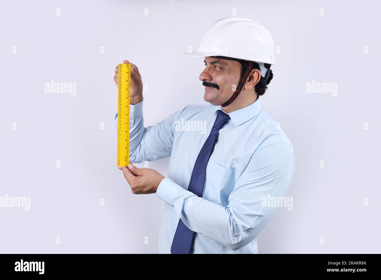 Happy Indian Construction worker doing engineer concept for future. The ...