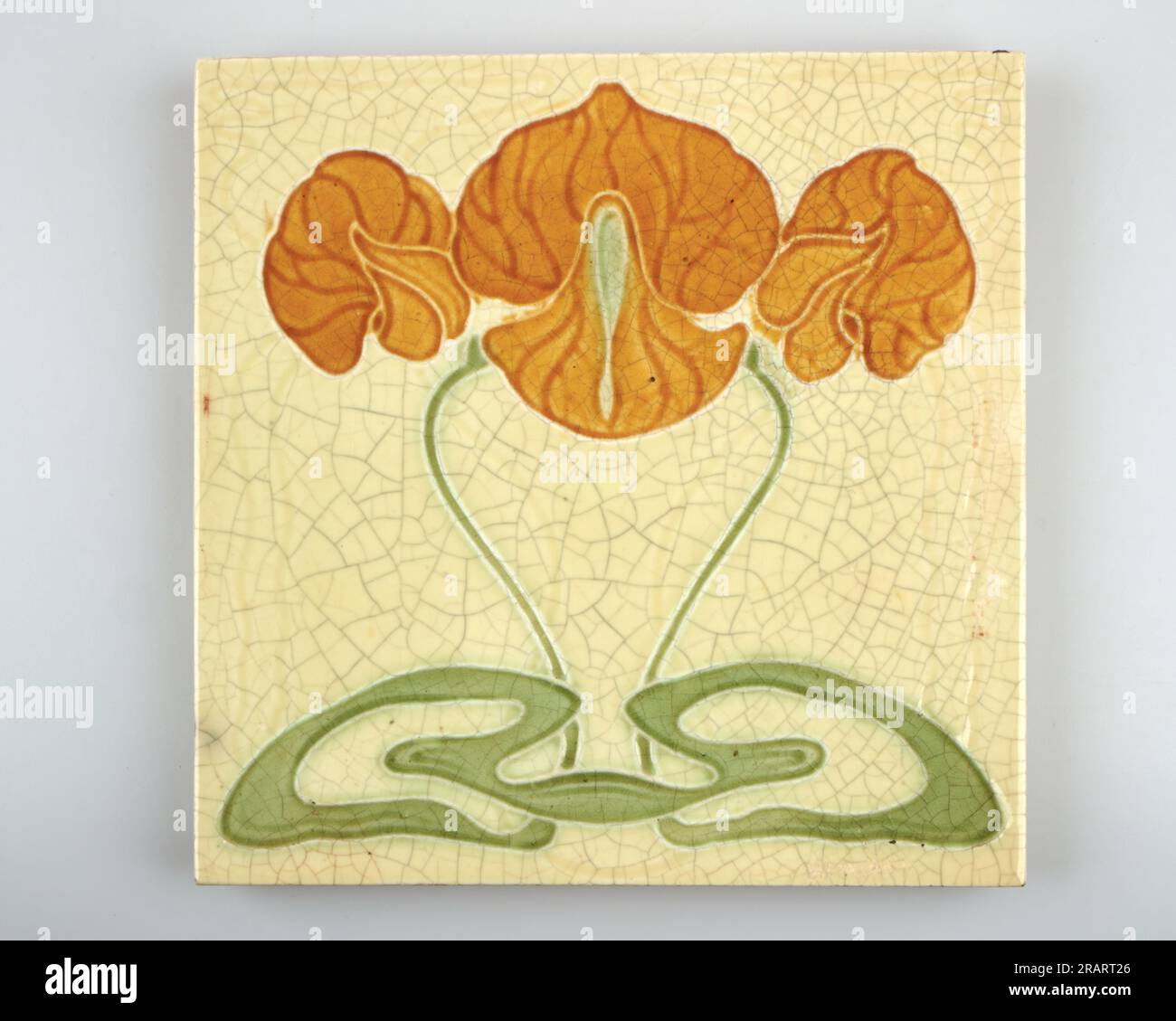 Antique 1900s J. H. Barratt Art Nouveau amber orchid pottery tile Stock ...