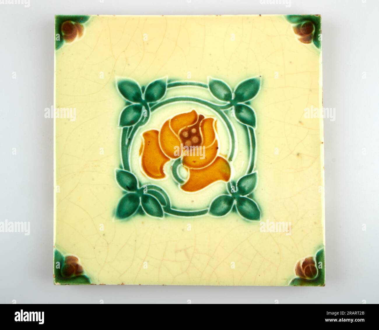 Antique 1900s J. H. Barratt Art Nouveau amber flower pottery tile Stock ...