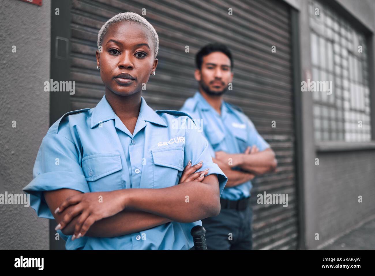 Portrait of black woman, security guard or arms crossed of safety ...