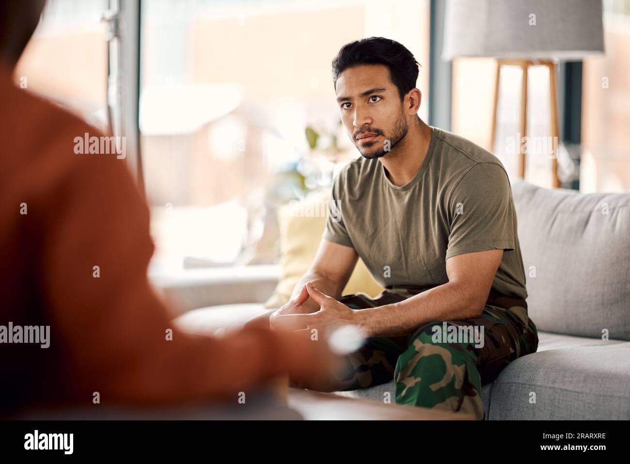 Support, therapy and a military man with a psychologist for counselling ...