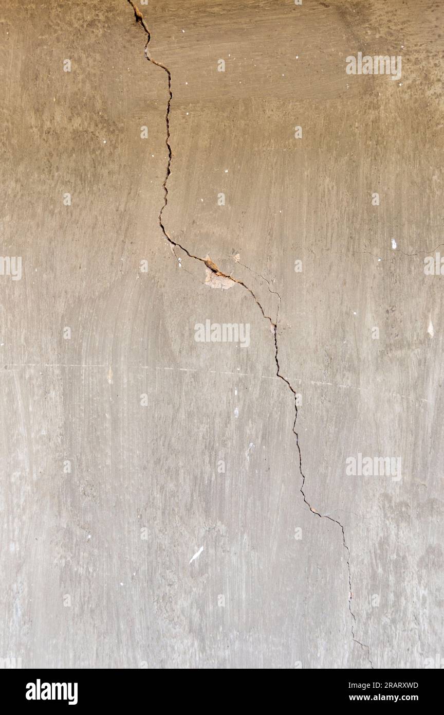 weather deteriorated wall where a crack is visible Stock Photo - Alamy