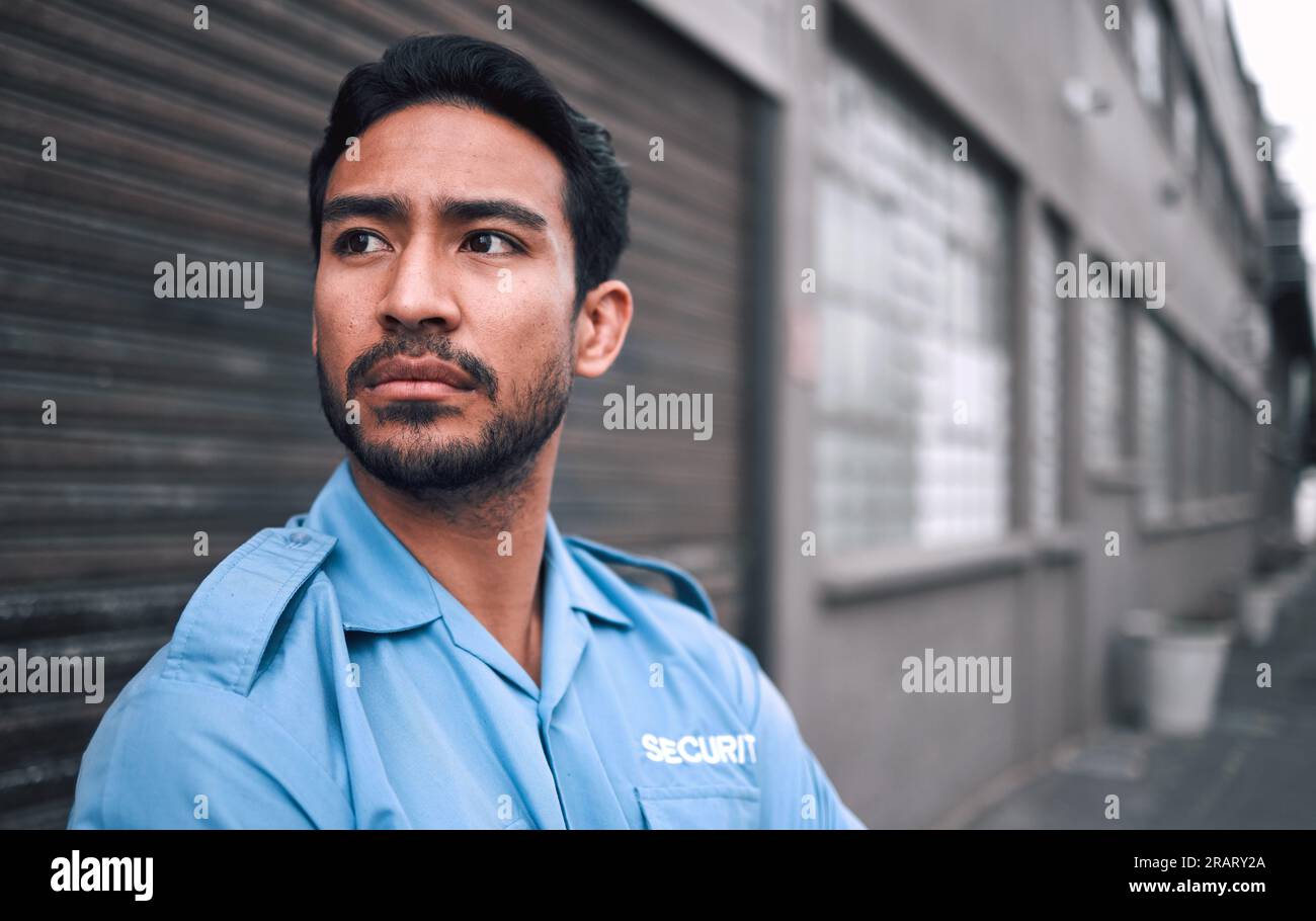 Serious, security guard or safety officer man on the street for ...